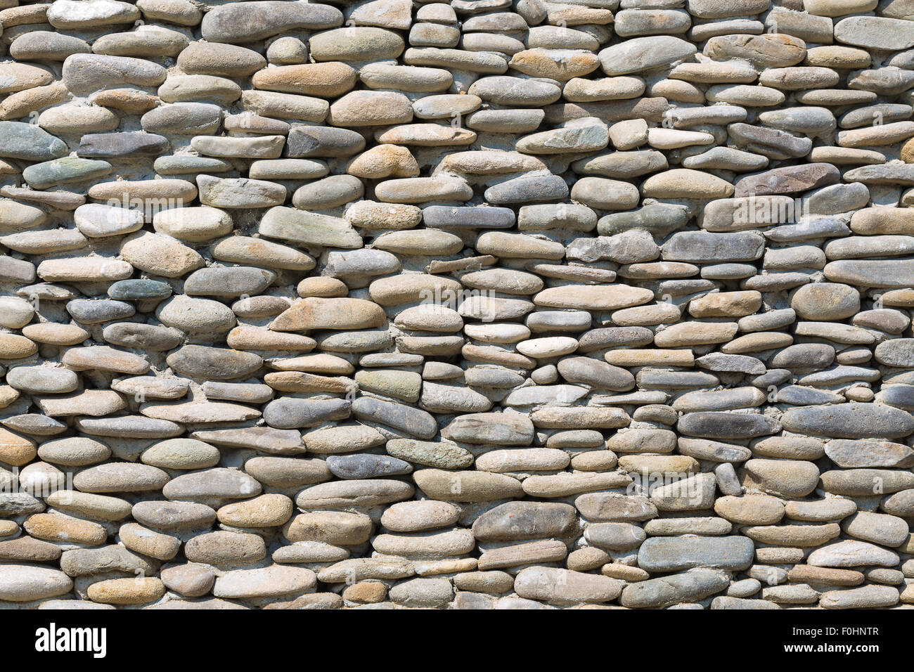 oval stones background Stock Photo - Alamy