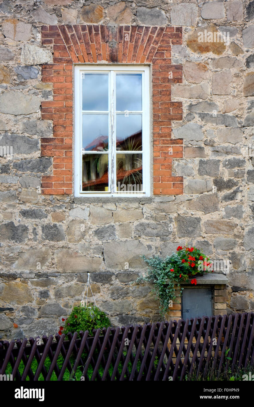 window on rustic stone wall Stock Photo - Alamy