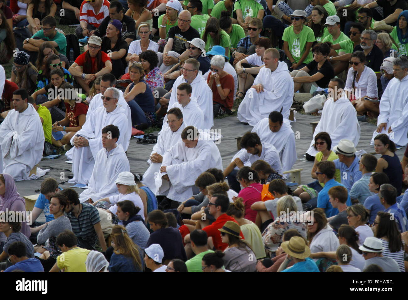 Taizé, France. 16th August 2015. The Brothers of Taizé sit in the ...