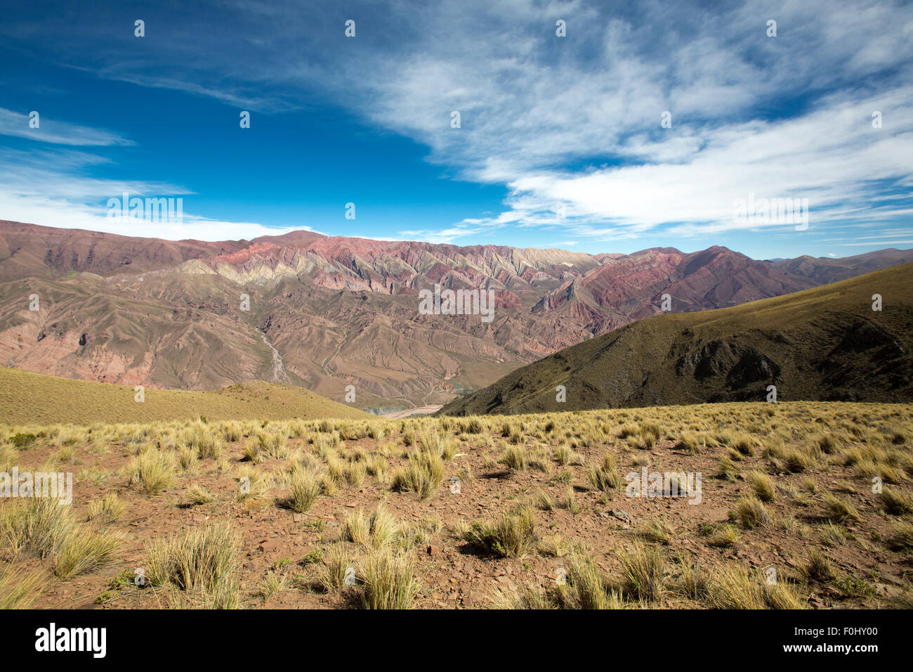 Mountain of fourteen colors, Quebrada de Humahuaca against a blue sky ...