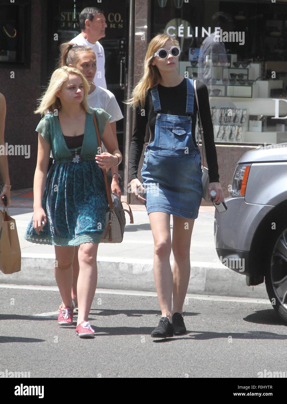 Pregnant Jaime King showing off her baby bump in a denim overall-style ...