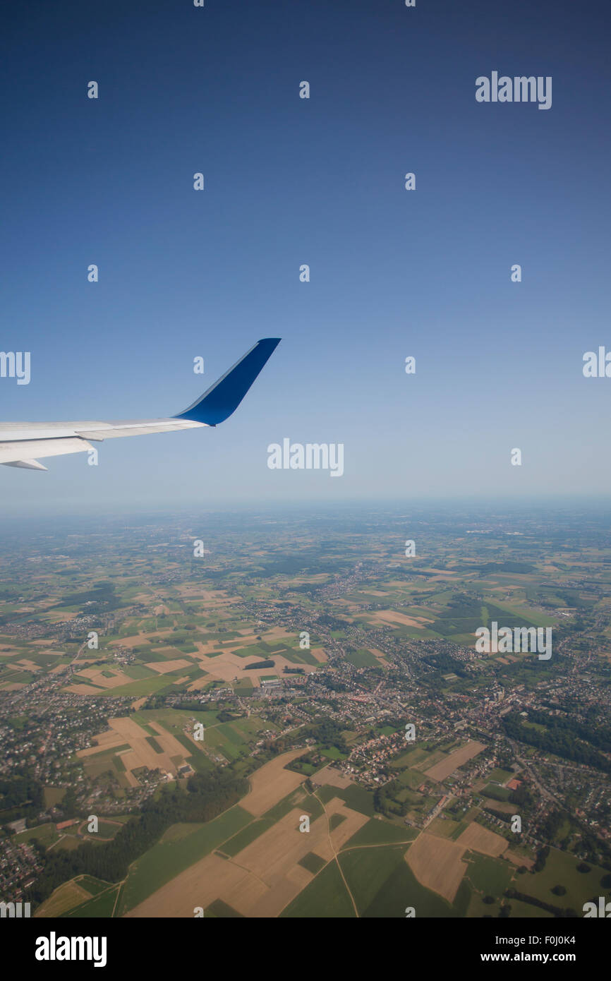 Peaceful view with blue sky and a detail of the plane's wing. Costa ...