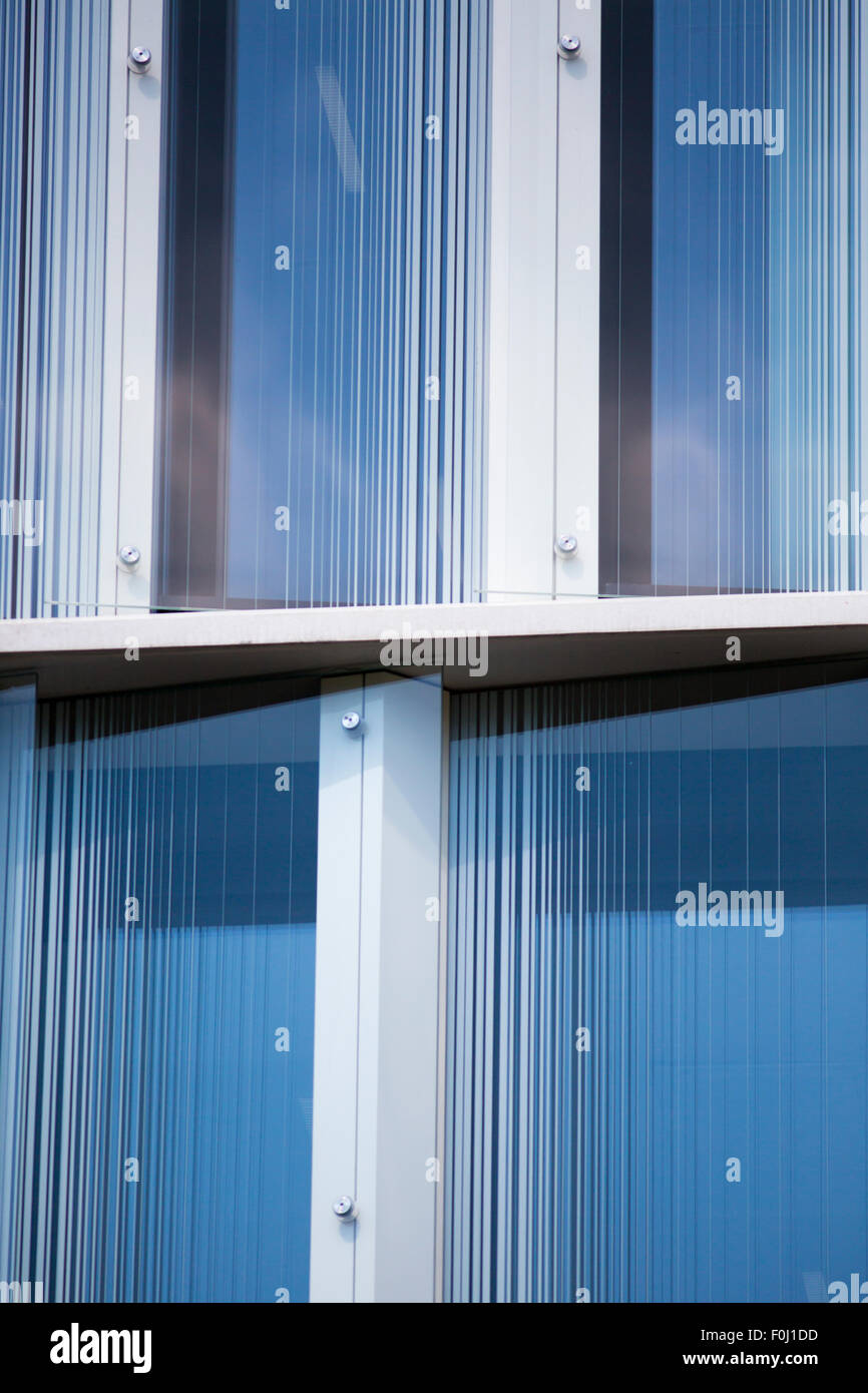 Modern skyscraper blue windows glass wall with reflections Stock Photo ...