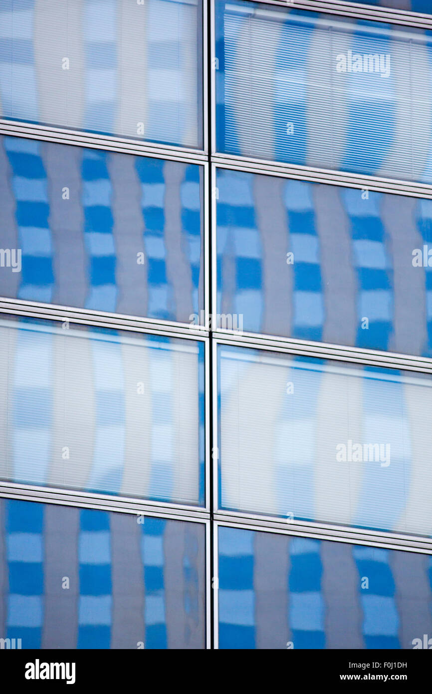 Modern skyscraper blue windows glass wall with reflections Stock Photo ...