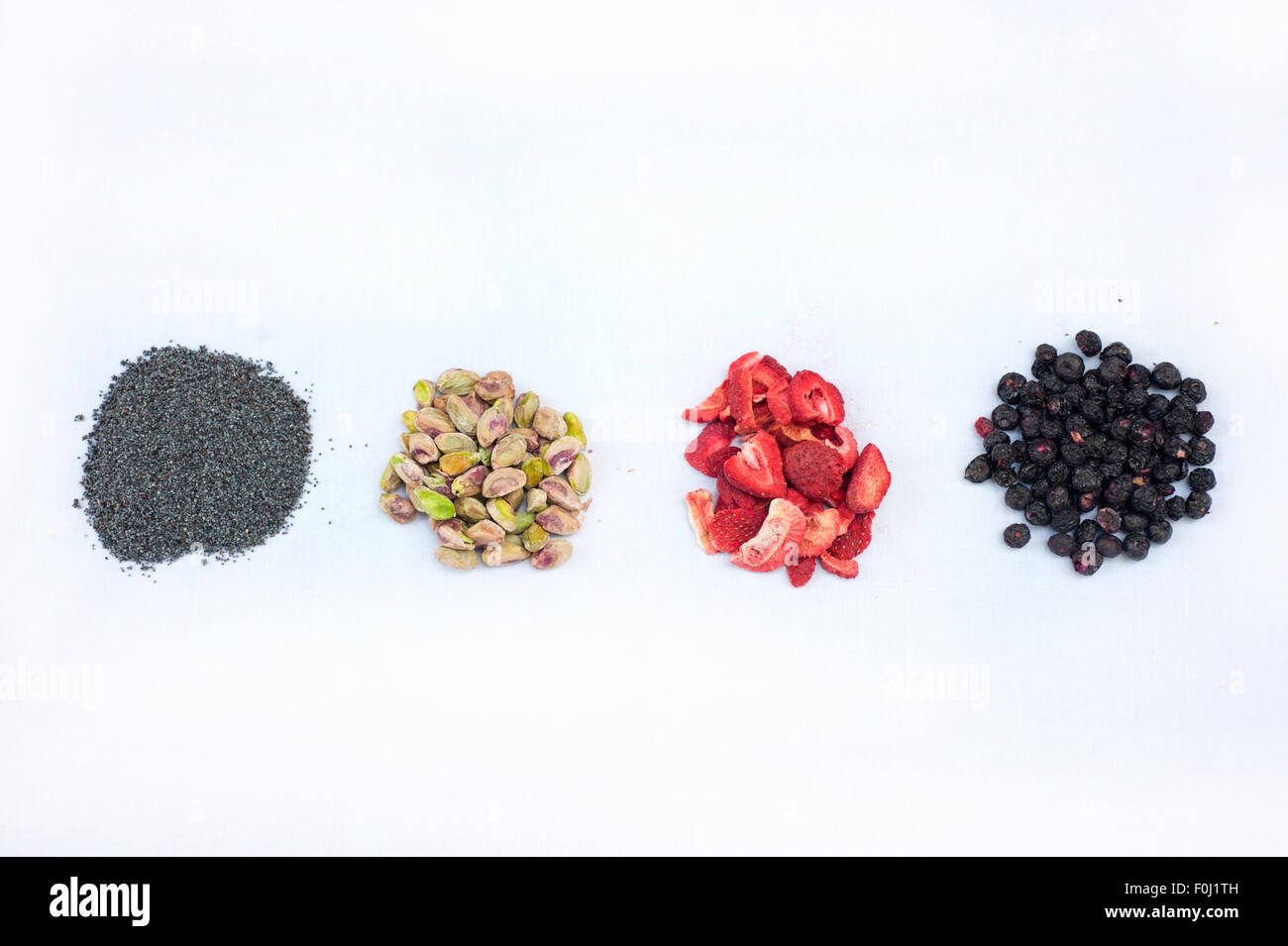 Poppy Seed, Pistachios, Strawberries, Blueberries Stock Photo - Alamy