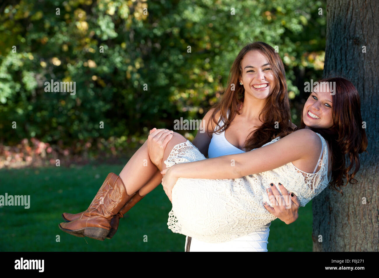 Carrying A Friend Stock Photo - Alamy