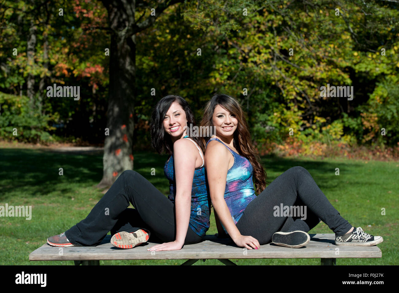 Happy Girls Posing Stock Photo - Alamy