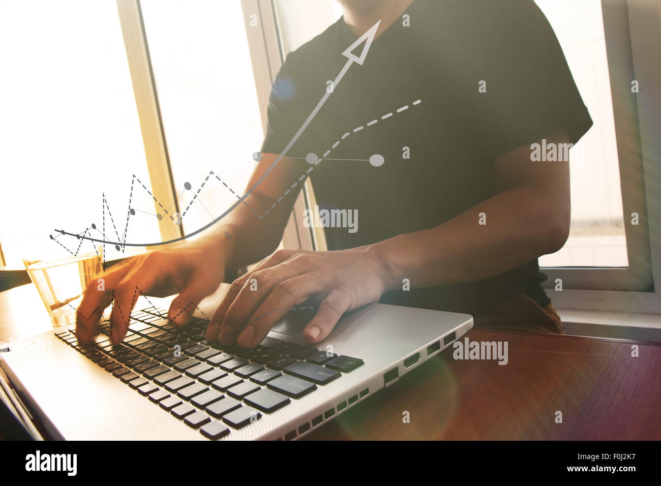 Close up of business man hand working on laptop computer with social ...