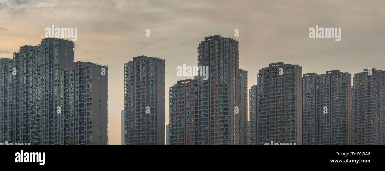 Row of residential buildings in China at dawn. Rapid real estate ...