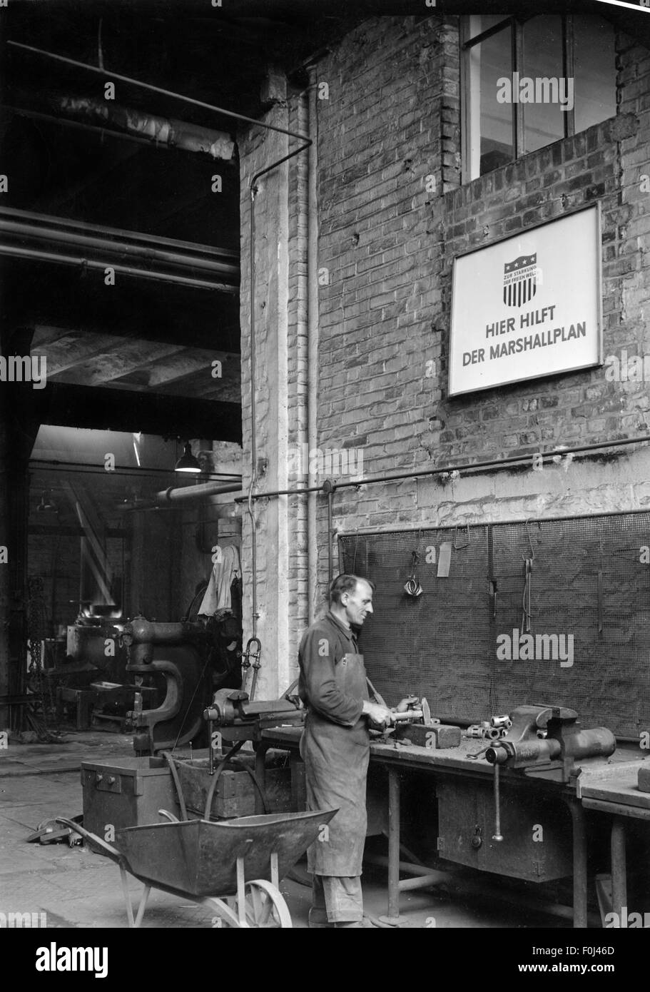 post war period, Marshall Plan, view into blacksmith's shop supported ...