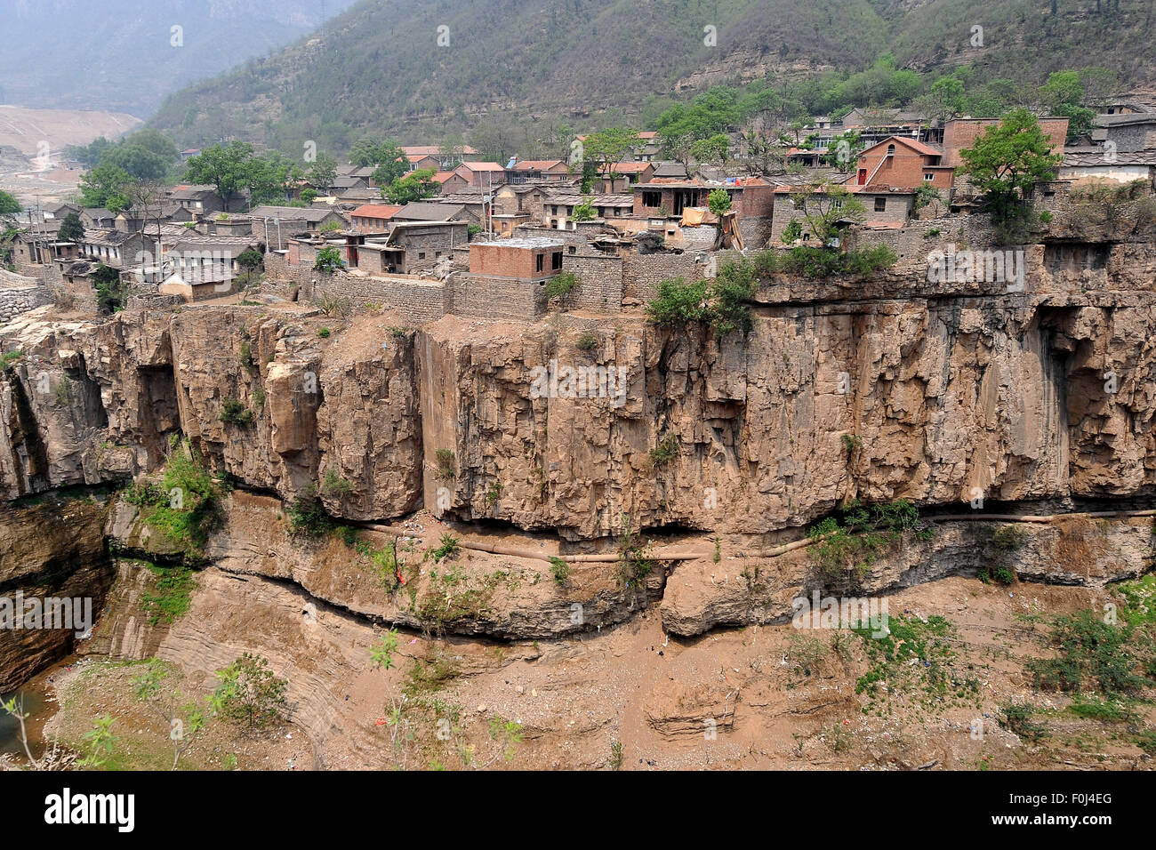 Taiyuan, China's Shanxi Province. 11th Aug, 2015. Houses built with red ...