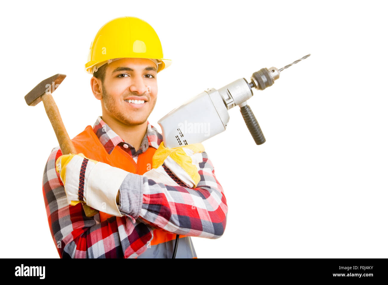 Construction worker holding drill machine and hammer Stock Photo - Alamy