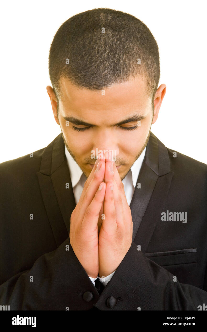 Religious business man folding his hands for a prayer Stock Photo - Alamy