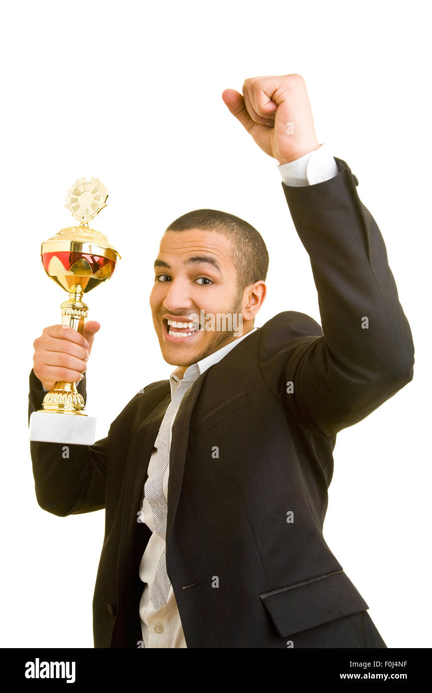 Happy manager cheering with a trophy in his hand Stock Photo - Alamy