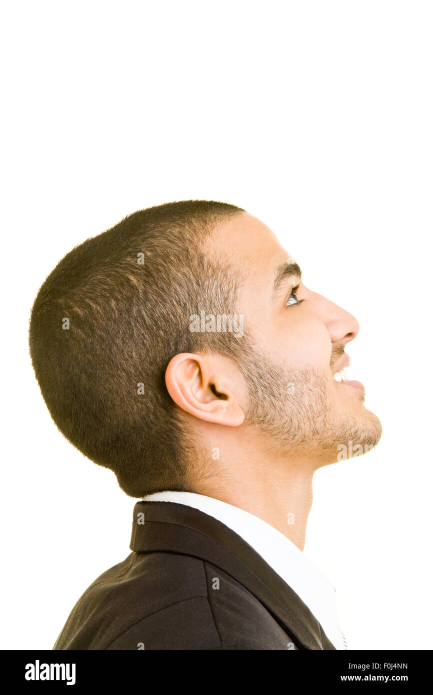 Side view of young manager looking up Stock Photo - Alamy