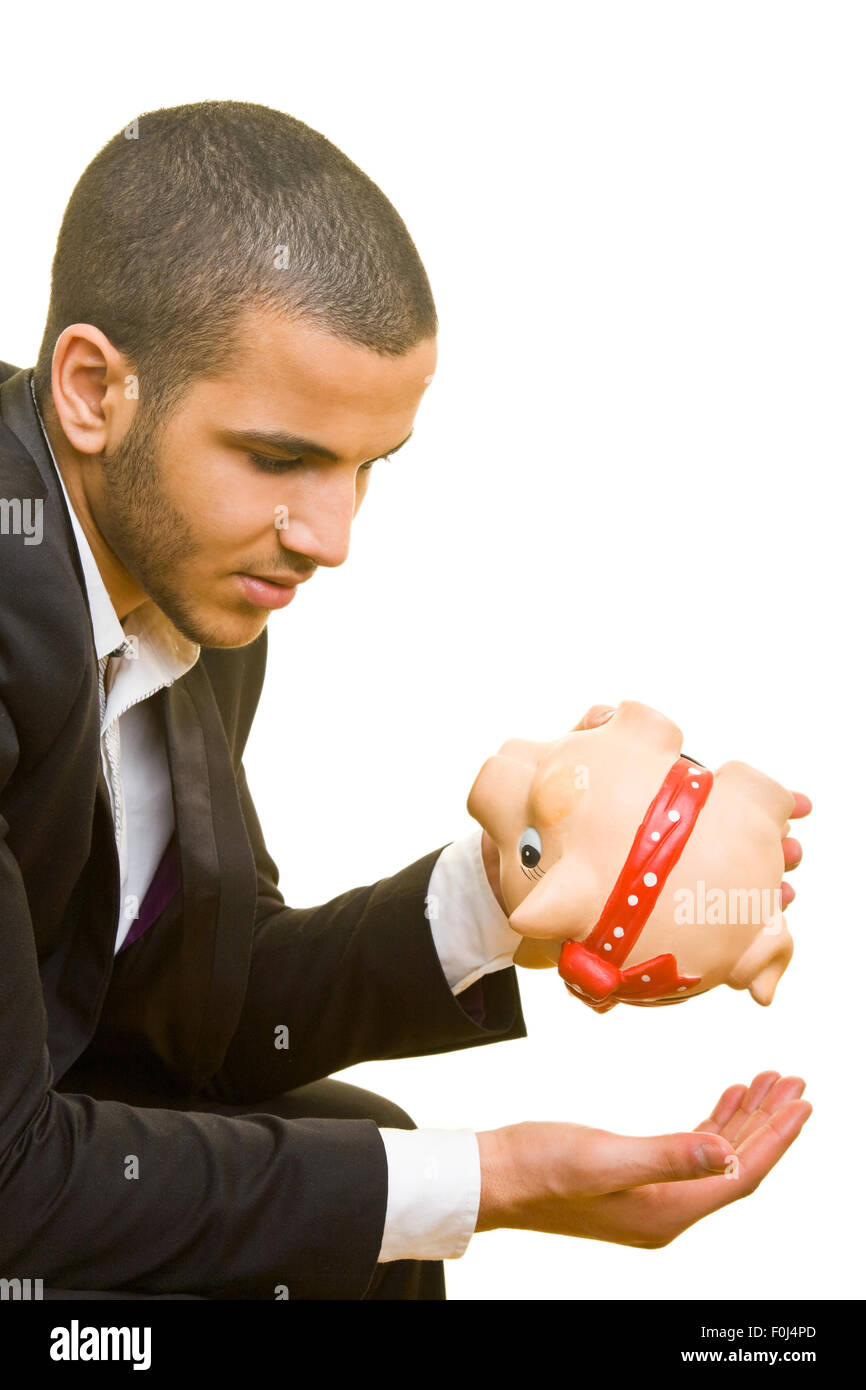 Frustrated manager with empty piggy bank in his hand Stock Photo - Alamy