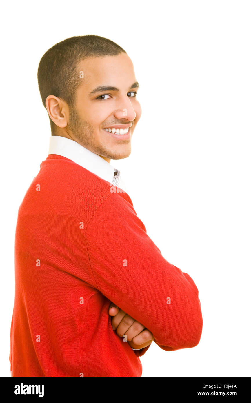 Side view of young happy man with arms crossed Stock Photo - Alamy