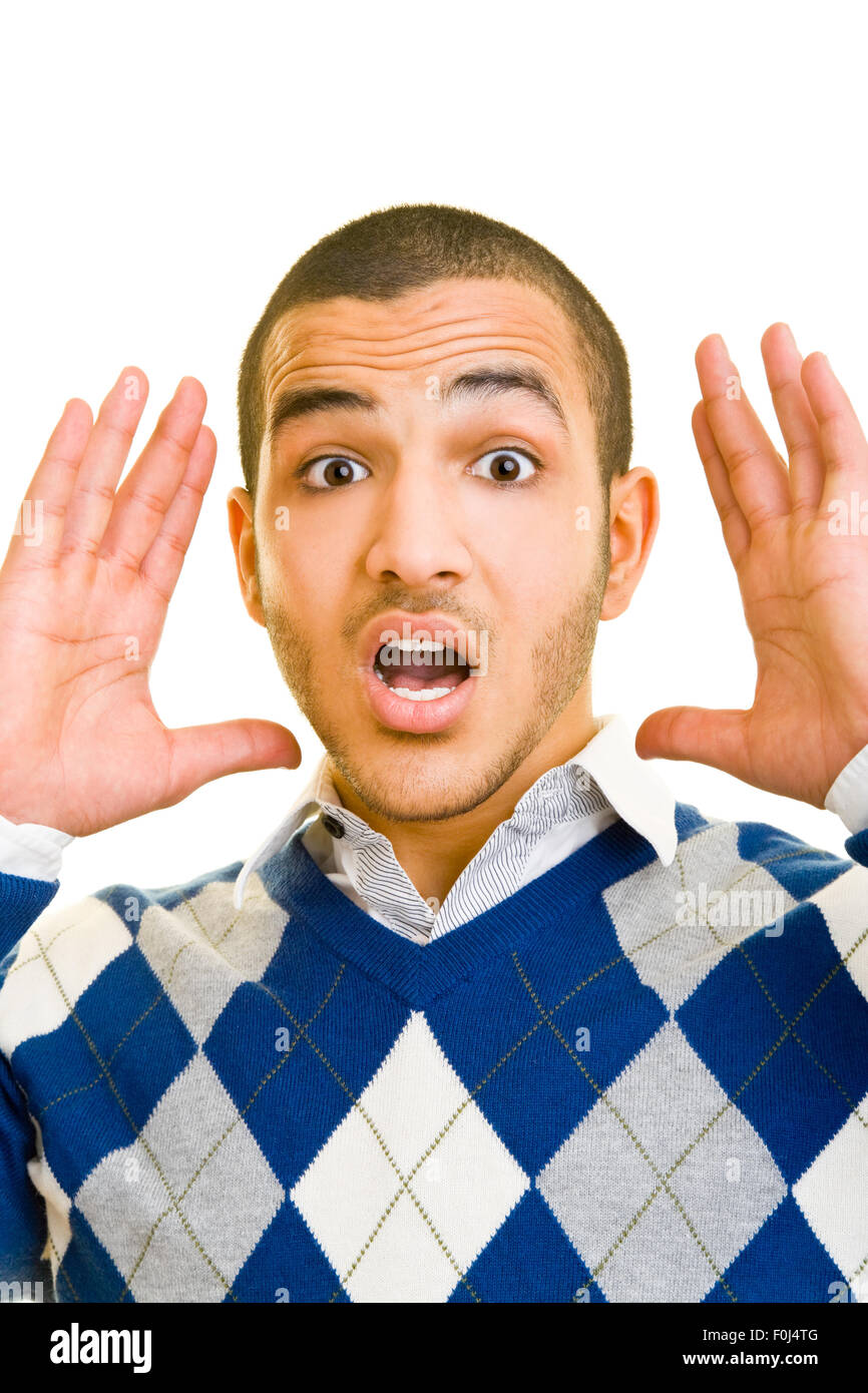 Young man looking afraid and shocked into the camera Stock Photo - Alamy