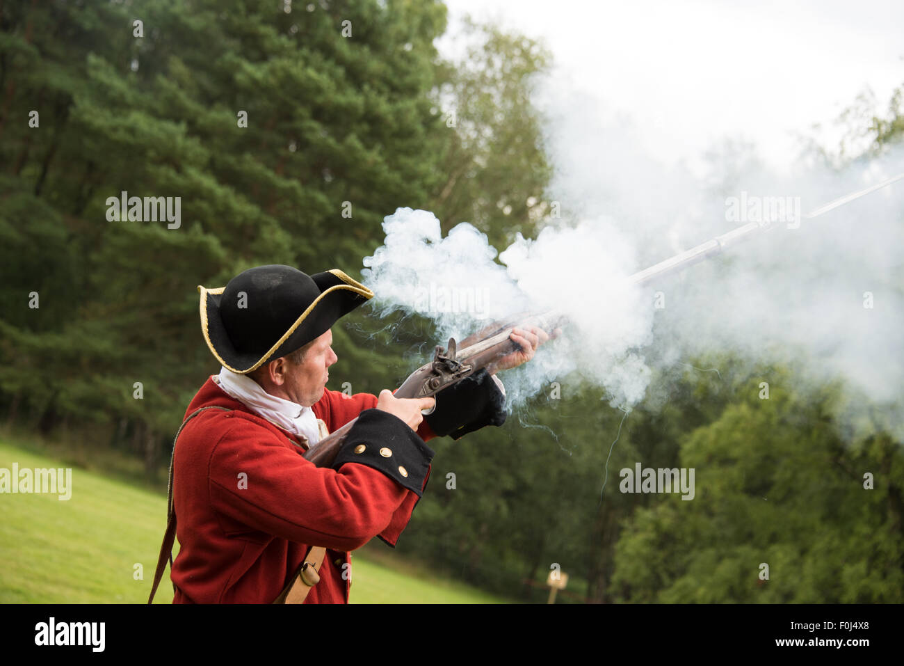 French military soldiers firing a musket during 18th Century Jacobite ...