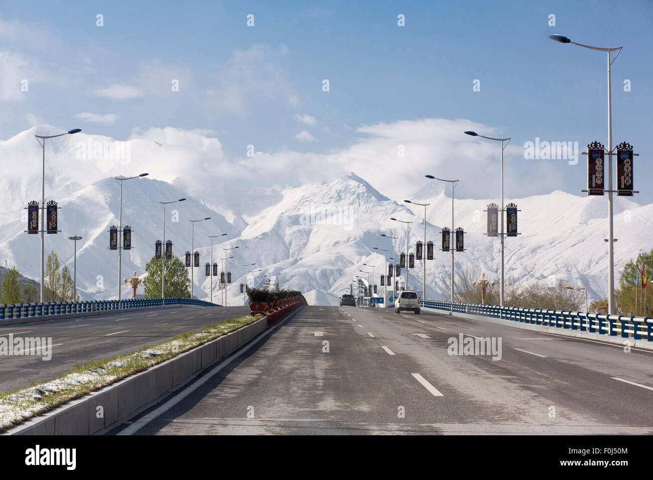 Leaving Lhasa on an empty Friendship Highway with a stunning view of ...