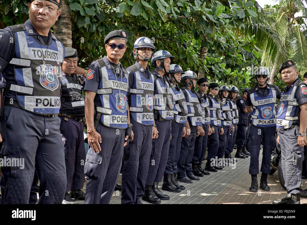 Line up of Thai tourist police to assist in crowd control. Thailand ...