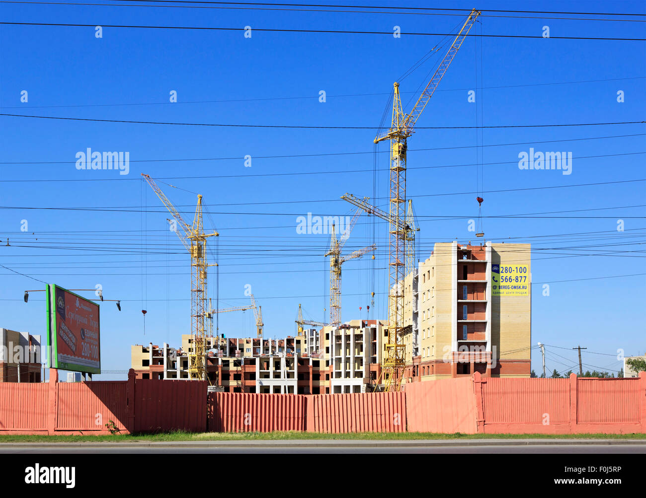 Construction of high-rise apartment brick building Stock Photo - Alamy