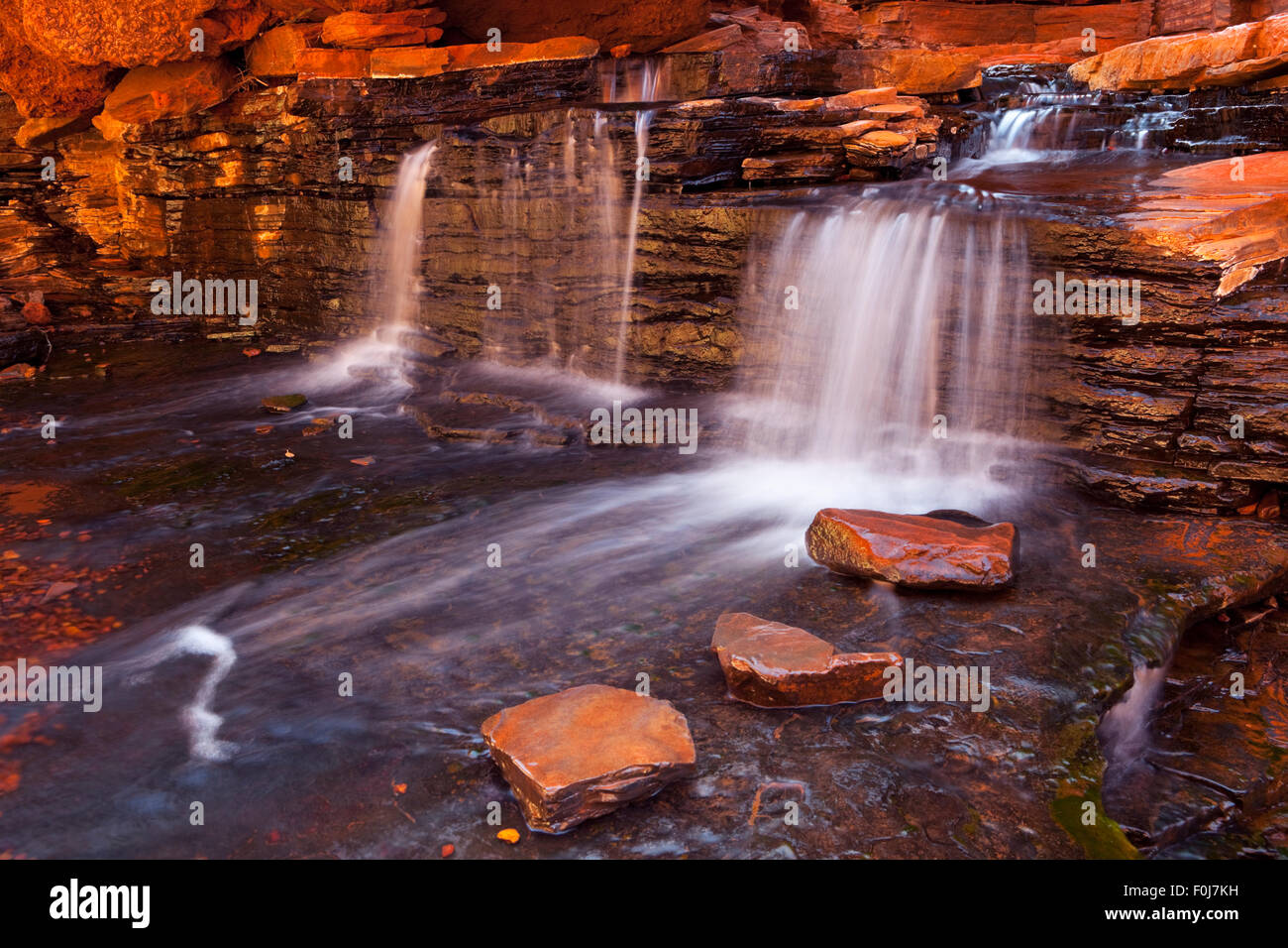 A small waterfall in the Hancock Gorge in Karijini National Park ...