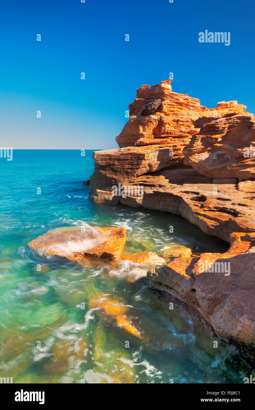 Red cliffs at Gantheaume Point, Broome, Western Australia on a bright ...