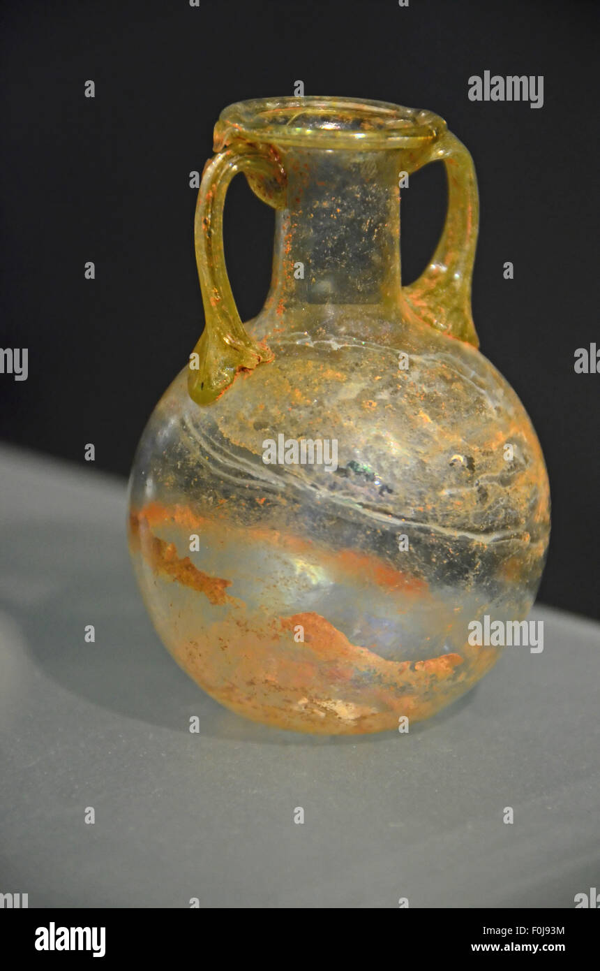 Ancient roman elegant glass vase with attractive golden veining and ...