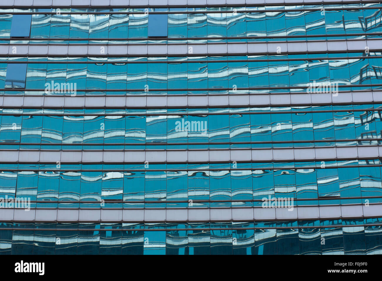 Steel blue background of glass building skyscraper in Shanghai, China ...