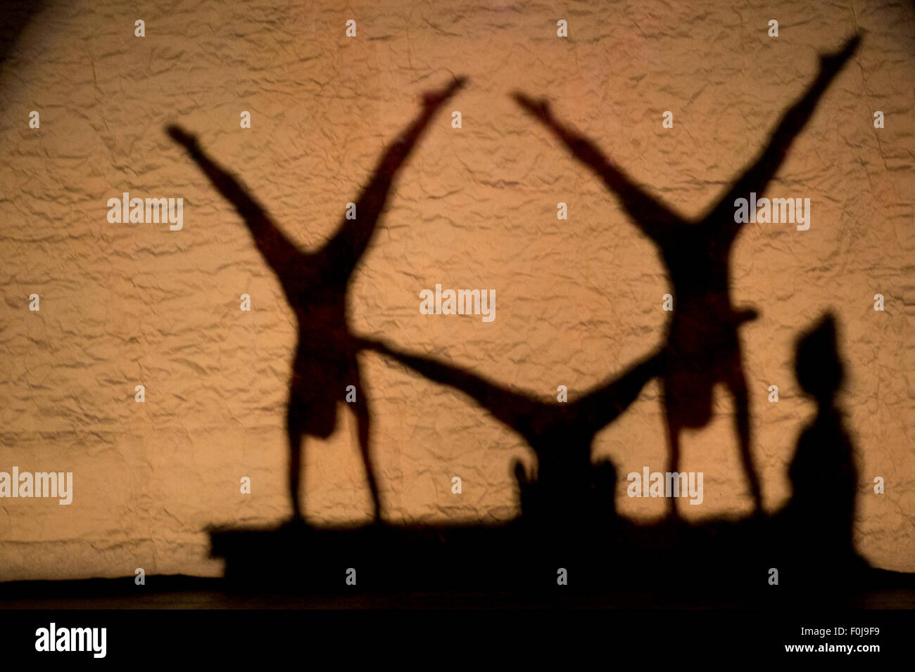 Circus of Shanghai - unidentified shadows of acrobat in action, China ...