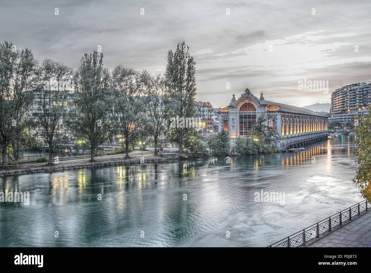 historic building in Geneva by sunset purple Stock Photo - Alamy