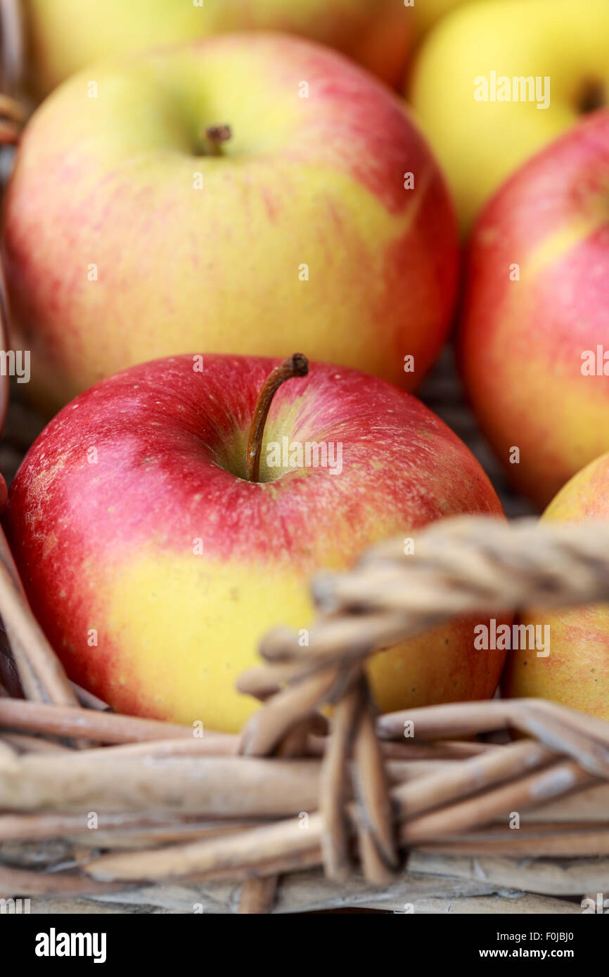 Red apples in a basket Stock Photo - Alamy