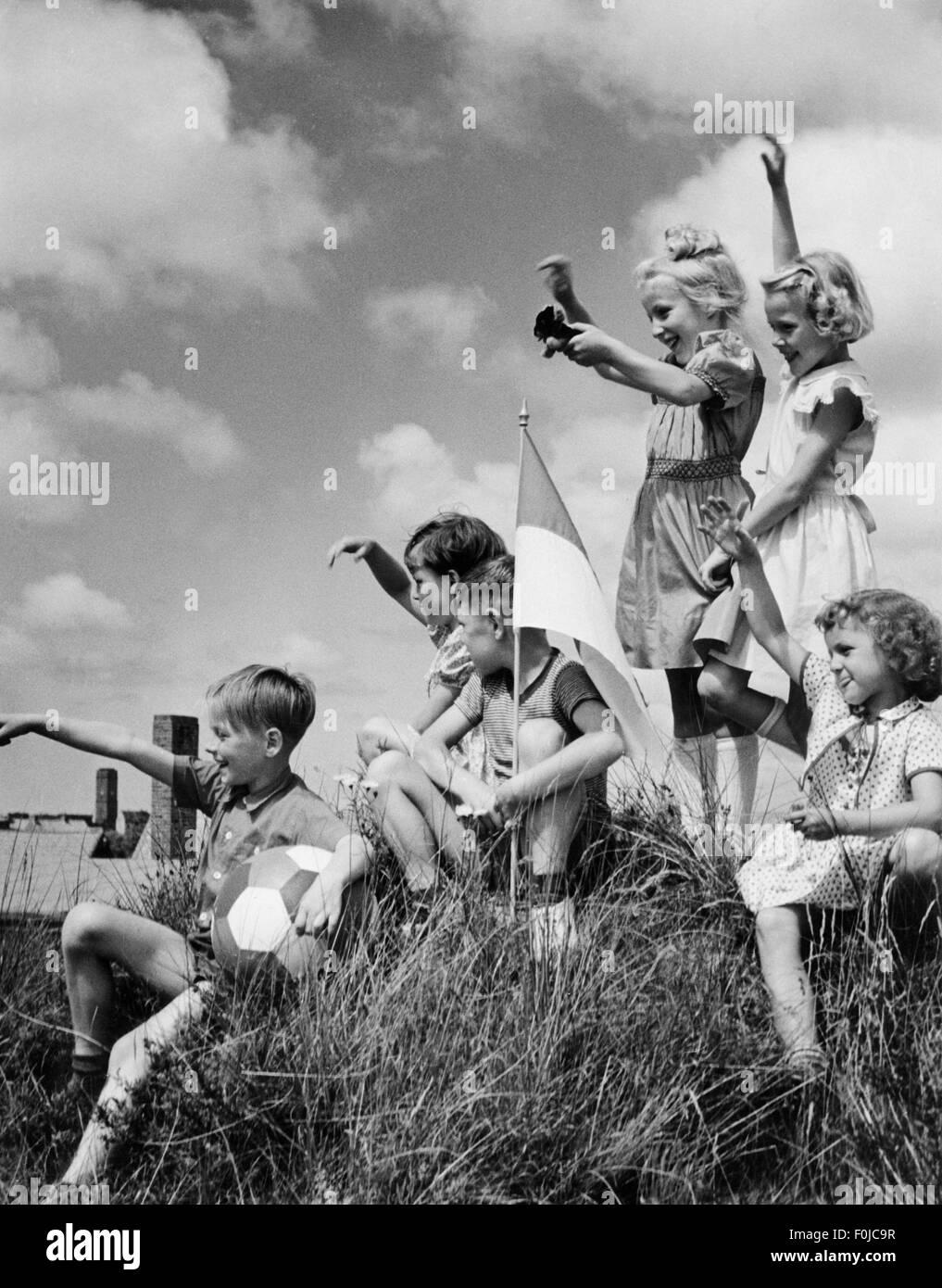 1940s children play hi-res stock photography and images - Alamy