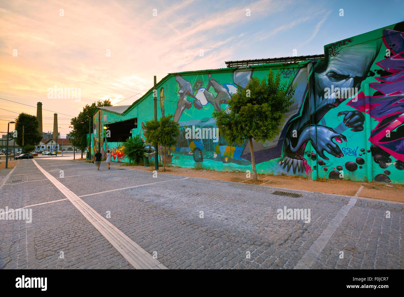 Street art on the building of trolleybus depot in the centre of Athens ...