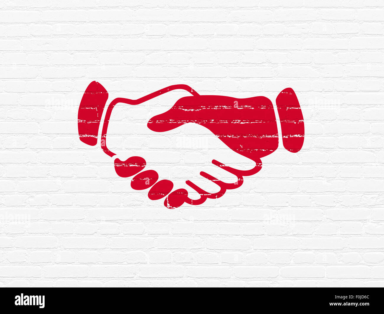 Political concept: Handshake on wall background Stock Photo - Alamy