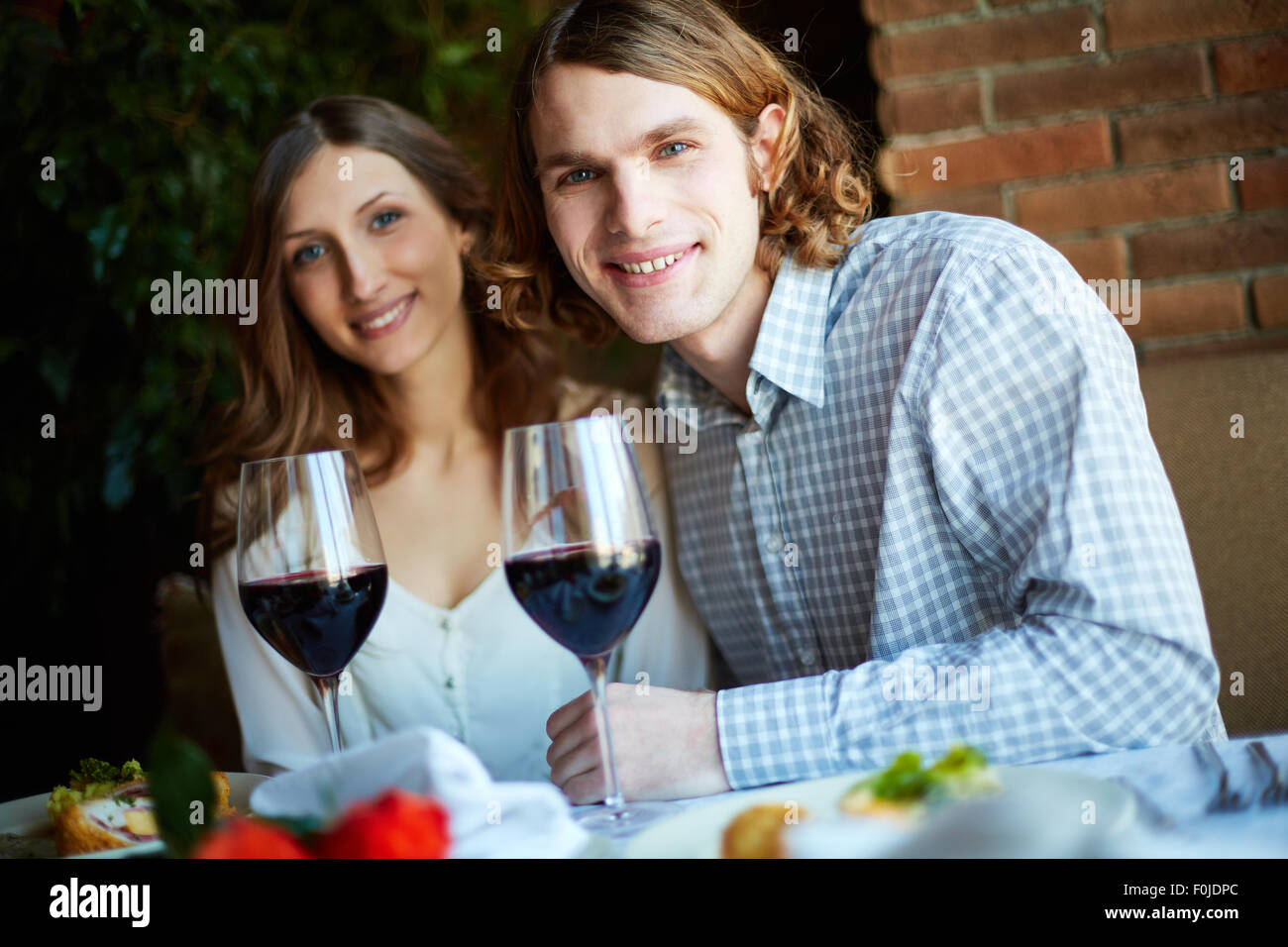 Having supper hi-res stock photography and images - Alamy