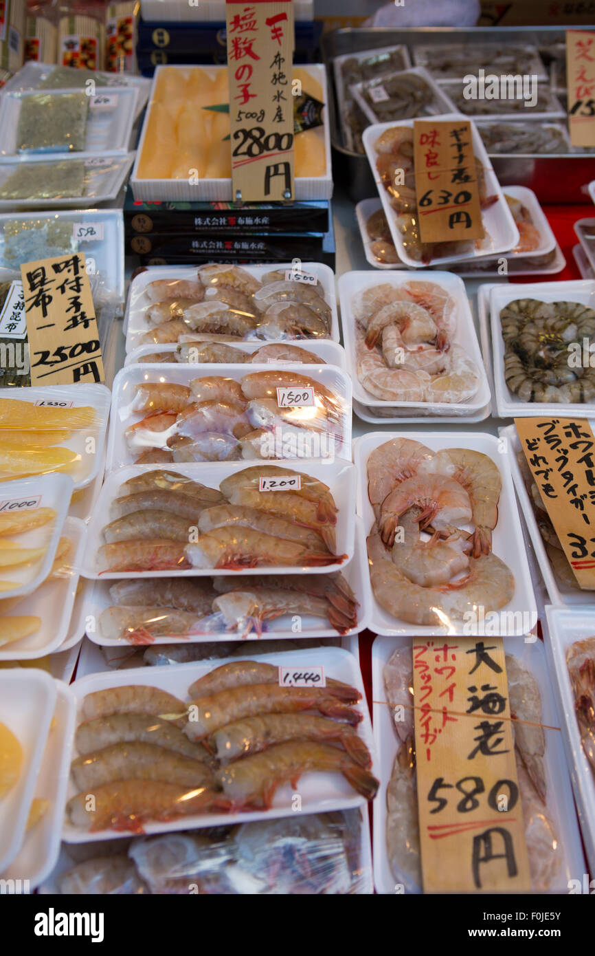 A collection of fish stored on ice at the tsukiji fish market, Tokyo ...