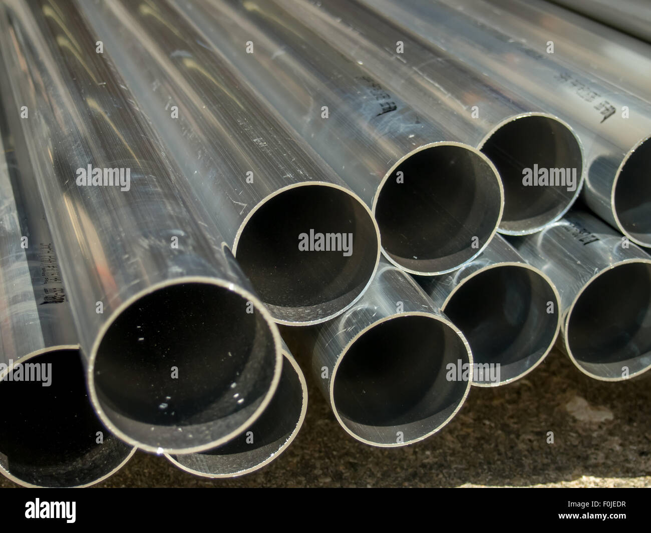 Stack of Many Pipes at the Construction Site Stock Photo - Alamy