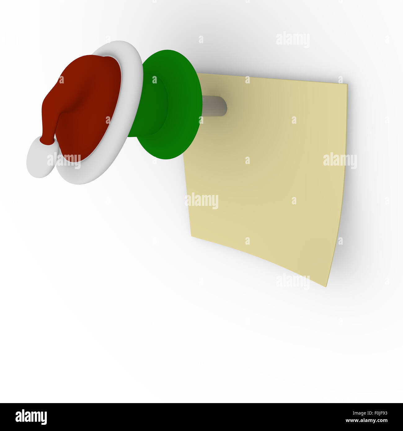 Sticky note with a green push pin and the hat of Santa Stock Photo - Alamy
