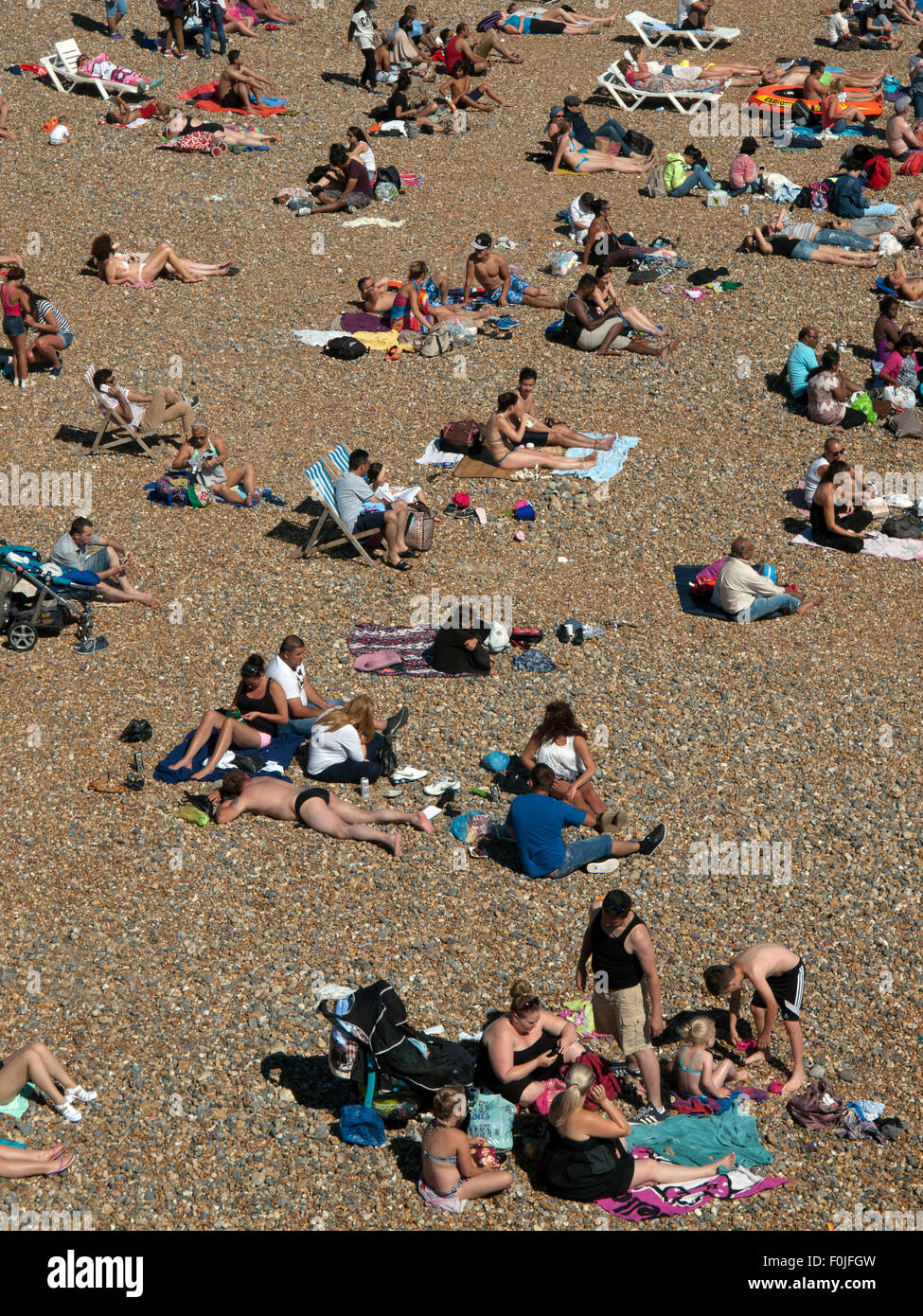 A busy day on the beach in sunny Brighton Stock Photo - Alamy