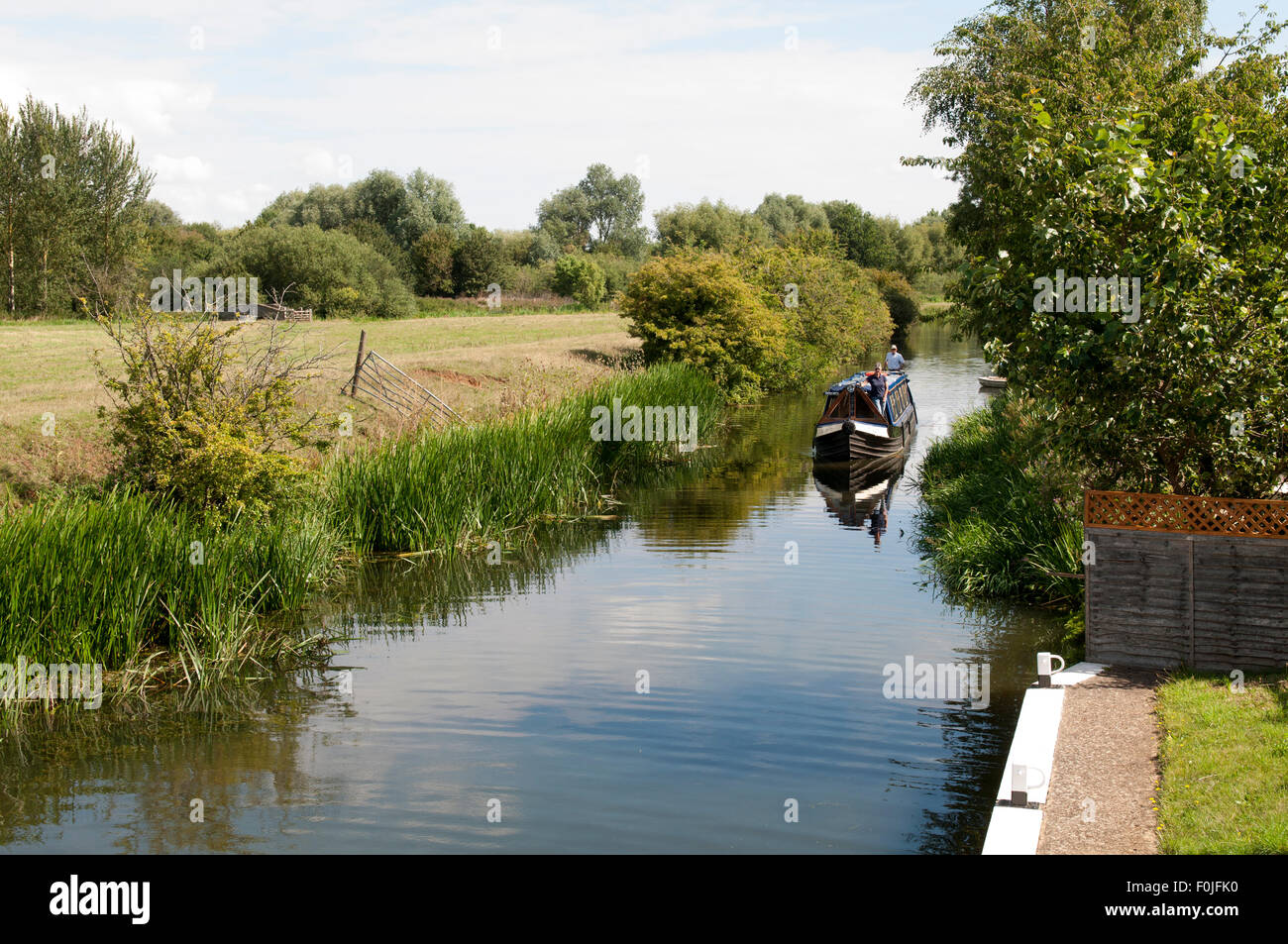 A narrowboat on the River Nene near Cogenhoe Lock, Northamptonshire ...