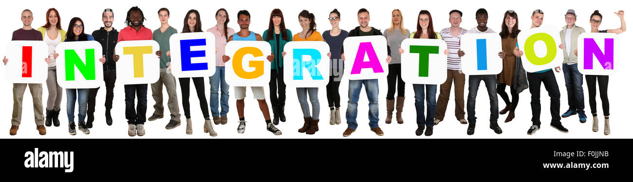 Smiling group of young multi ethnic people holding word integration ...