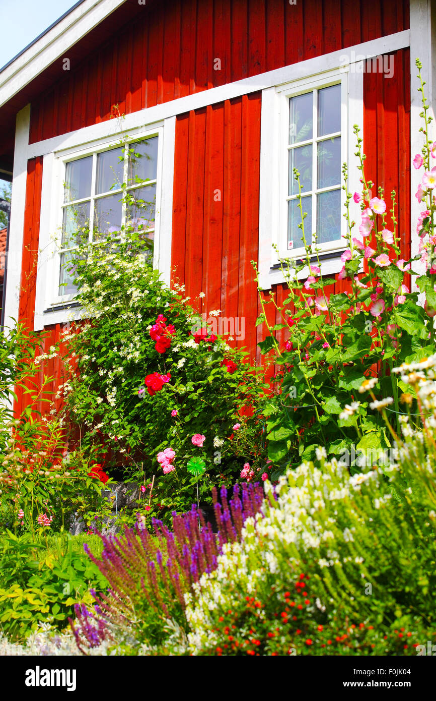 summer cottage with flower in the garden Stock Photo - Alamy