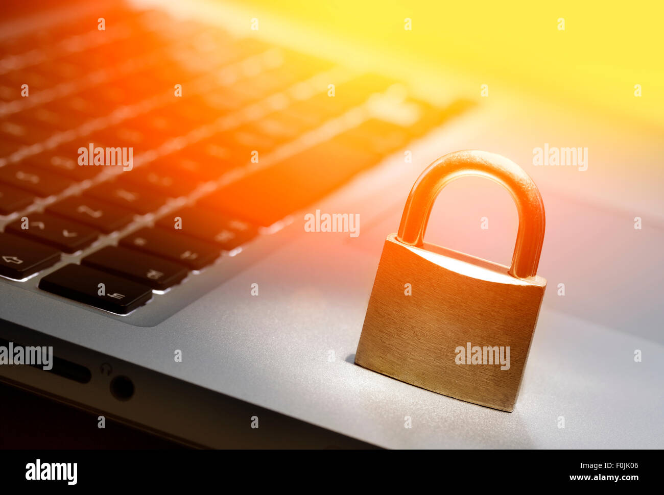Lock on laptop keyboard with shallow depth of field Stock Photo - Alamy