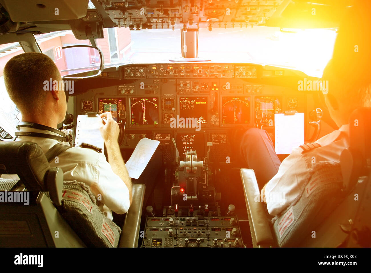 Pilots Working in an Aircraft Stock Photo - Alamy