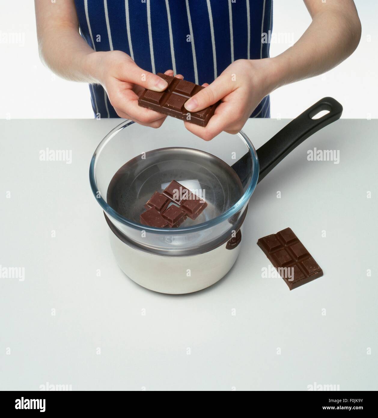 Breaking chocolate bar High Resolution Stock Photography and Images - Alamy