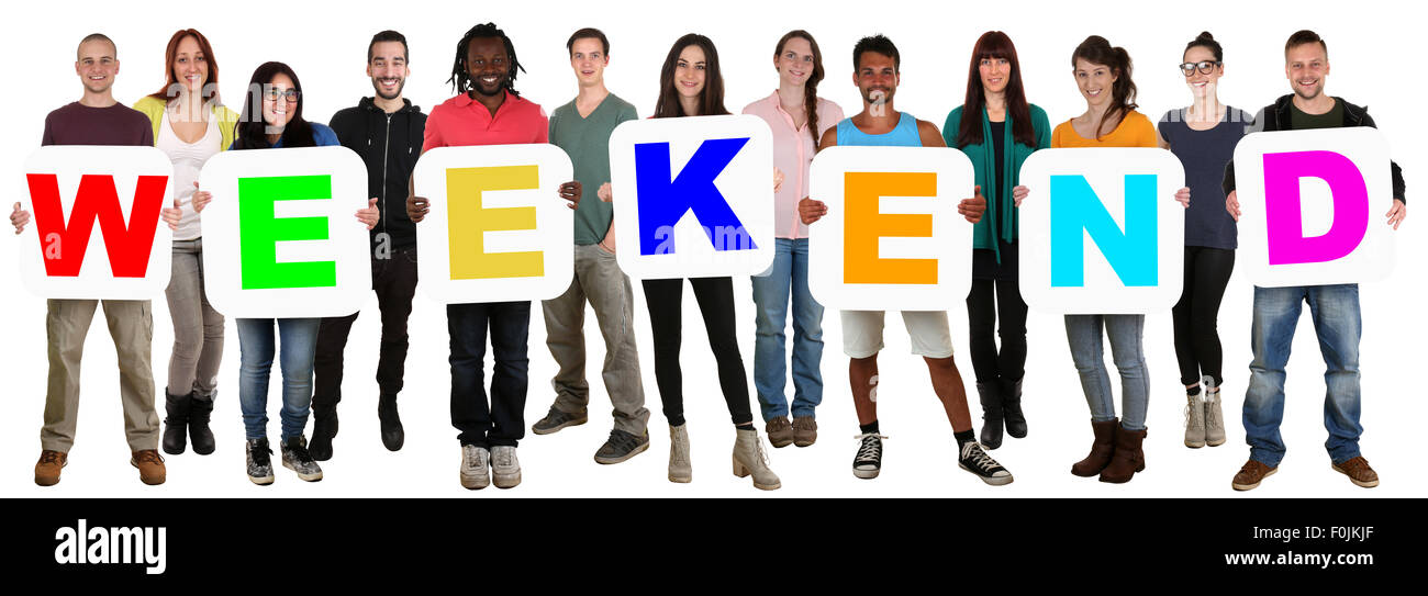 Smiling group of young multi ethnic people holding word weekend ...