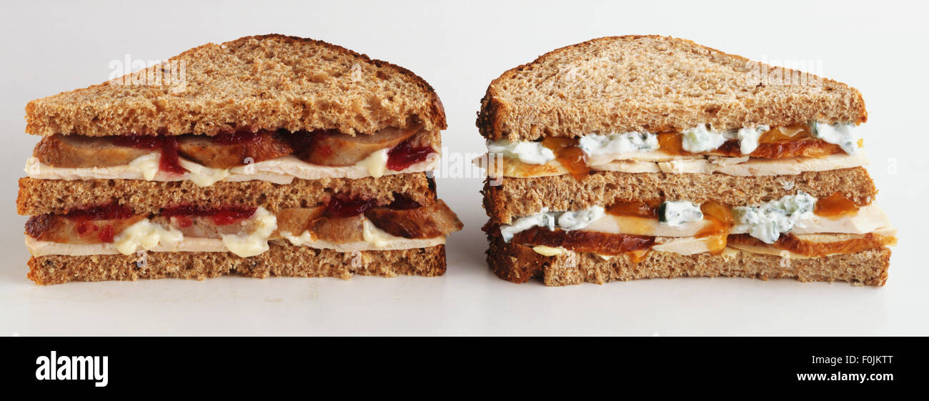 Side view of triple sandwich with cheese, mango chutney, sausage, and ...