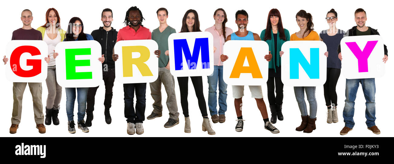 Smiling group of young multi ethnic people holding word Germany ...